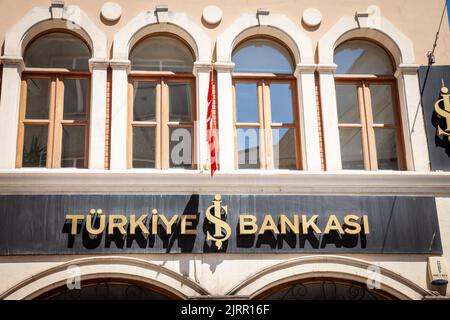 Picture of a sign with the logo of Turkiye IS Bankasi taken in front of ...