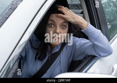 woman driver scared shocked before crash or accident Stock Photo - Alamy
