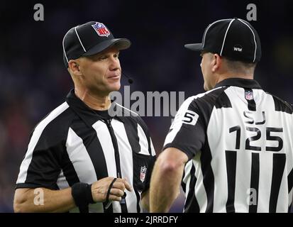 Side judge Chad Hill (125) waches an NFL football game between the Los ...