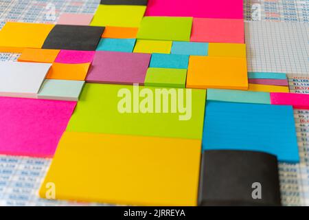 pile of sticky notes on office table at work Stock Photo - Alamy