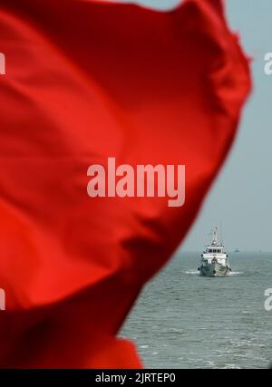 DONGYING, CHINA - AUGUST 26, 2022 - A formation of sailing boats is ...