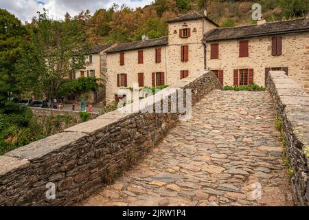 The Gothic stone bridge pont cournut of Brousse-le-Château, France ...