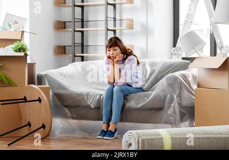 sad asian woman with stuff moving to new home Stock Photo - Alamy