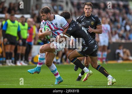 Henry Purdy of Bristol Bearsis tackled by Rio Dyer of Dragons Rugby ...