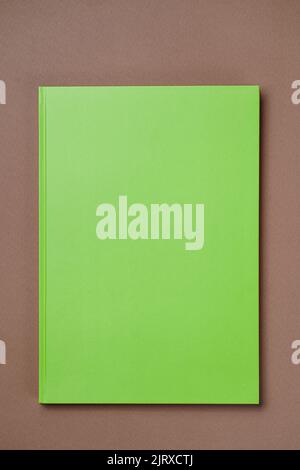 Greeen Leather notebook on paper brown background, notepad mock up, top ...