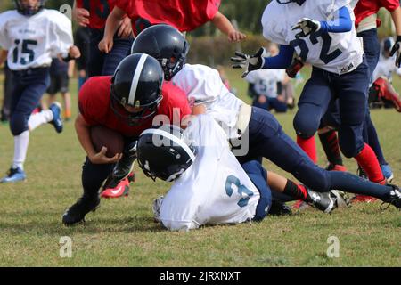 Youth American football Stock Photo - Alamy