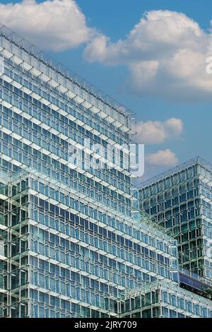Modern buildings on sky background Stock Photo - Alamy