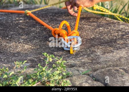 Carabiner with rope on nature background. Climbing uquipment.Climbing ...