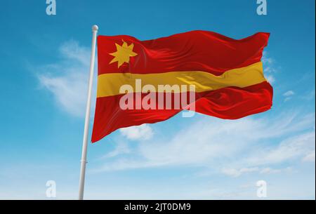 official flag of Toa Alta untied states of America at cloudy sky ...
