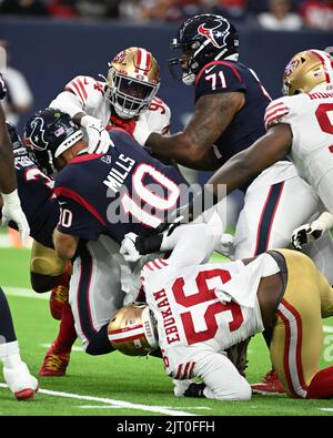Houston Texans defensive end Charles Omenihu (94) sits on the field ...