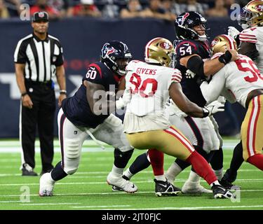 Houston Texans center Scott Quessenberry (54) looks at a video screen ...