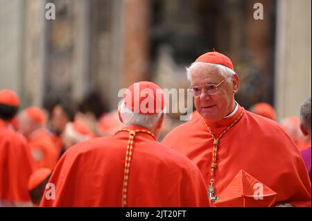 Cardinal Gerhard Ludwig Müller stands in a gateway on his way to a ...