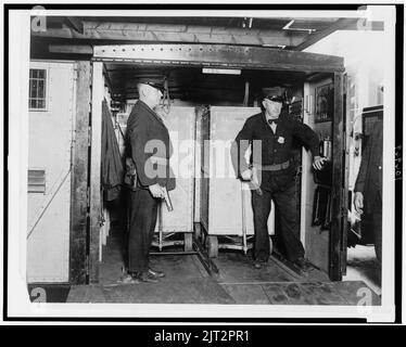 Transporting the new small size currency Stock Photo - Alamy