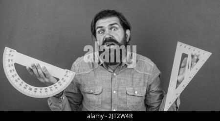 man confused with size measured on protractor and triangle ruler math ...