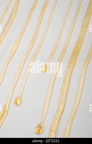 dripping drops of yellow cannabis wax with a high content of thc on ...