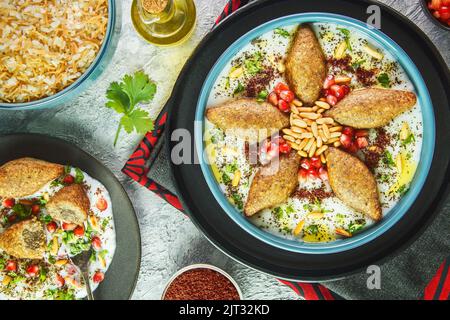 Oriental rice with pine nuts and laban dip from Jordan Stock Photo - Alamy