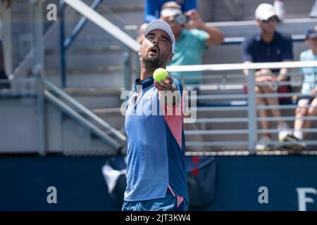 Brandon Holt of the United States during their first round match of the ...