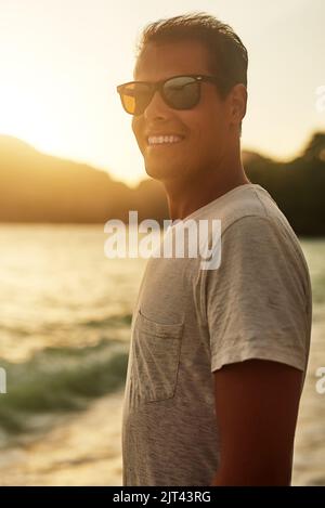 Young handsome man standing over isolated background shouting ...