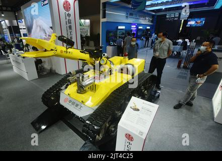 HANGZHOU, CHINA - AUGUST 28, 2022 - Visitors look at a fire ...