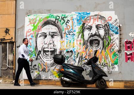 Beirut, Lebanon: A wall is painted with graffiti of screaming people at ...