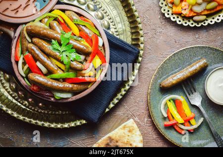 Arabic cuisine; Egyptian Traditional sausage and liver dishes. Served ...