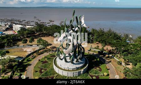 Aerial view of the A giant shark and crocodile statue as a symbol of ...