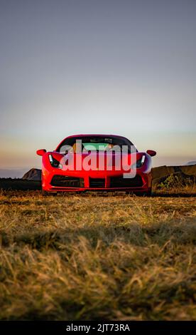 A vertical shot of a red Ferrari 488 GTB super car Stock Photo - Alamy