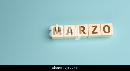 The word March built from letters on wooden cubes. High angle view with ...