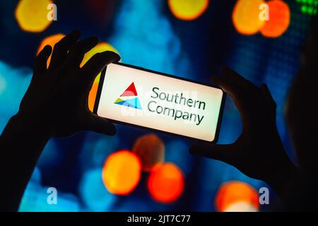 In this photo illustration, Southern Company logo seen displayed on a ...
