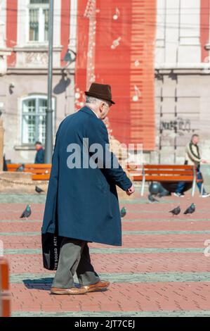 Timisoara, Romania - March 15, 2018: Woman walking on the street. Real ...