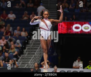 Shilese Jones of the U.S. competes on the uneven bars during the Women ...