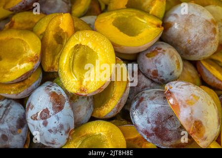 Plum halves background. Juicy pulp of plums texture. Farm organic ...