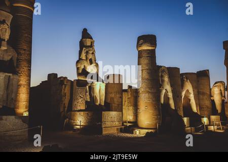 Ancient Egyptian Ruins of God Statues near the Pylon of Luxor Temple ...