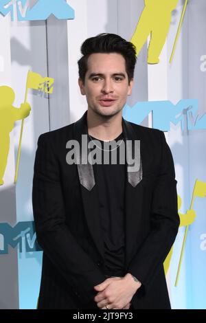 Brandon Urie of Panic at the Disco walking on the black carpet at the ...