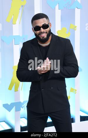 Johnny Middlebrooks walking on the black carpet at the 2022 MTV Video ...