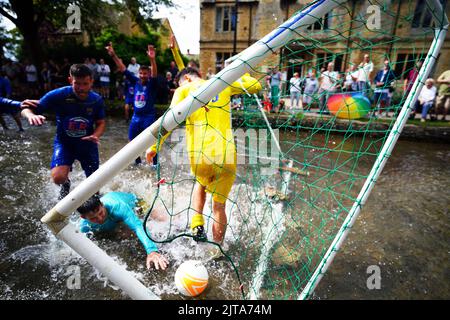 Footballers from Bourton Rovers during the annual traditional River ...