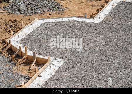 Concrete foundation and backfilling of rubble Stock Photo - Alamy