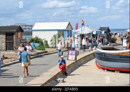 Brighton UK 29th August 2022 - Visitors enjoy the sunshine on Brighton ...