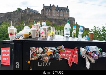 A bin overflowing with litter on Castle Street in Edinburgh city centre ...