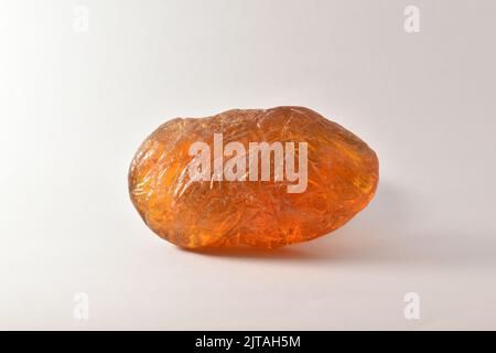 Raw colophony isolated on white background. Rosin Stock Photo - Alamy