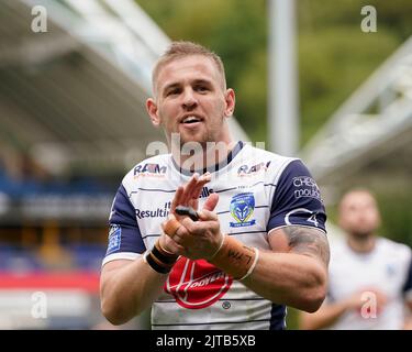 Matt Dufty #36 of Warrington Wolves touches down to score an early try ...