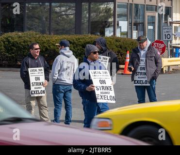 The workers in Boston walk the picket line during a worker's strike ...