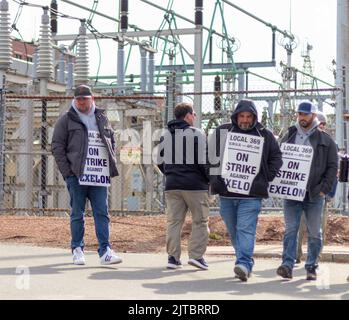 The workers in Boston walk the picket line during a worker's strike ...