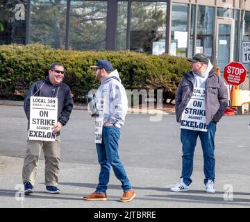The workers in Boston walk the picket line during a worker's strike ...