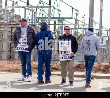 The workers in Boston walk the picket line during a worker's strike ...