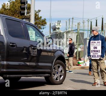 The workers in Boston walk the picket line during a worker's strike ...