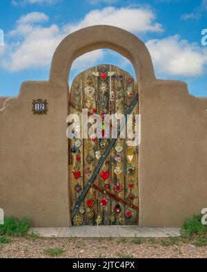 Adobe architecture with a door in Taos, New Mexico, USA Stock Photo - Alamy
