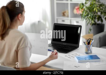 math teacher having online class at home Stock Photo - Alamy
