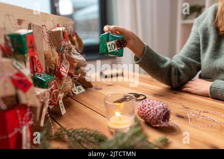 hands making christmas advent calendar at home Stock Photo - Alamy