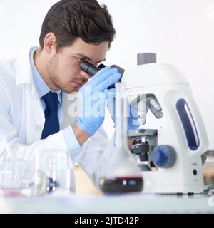 Identifying microorganisms that are causing infection. a young male ...